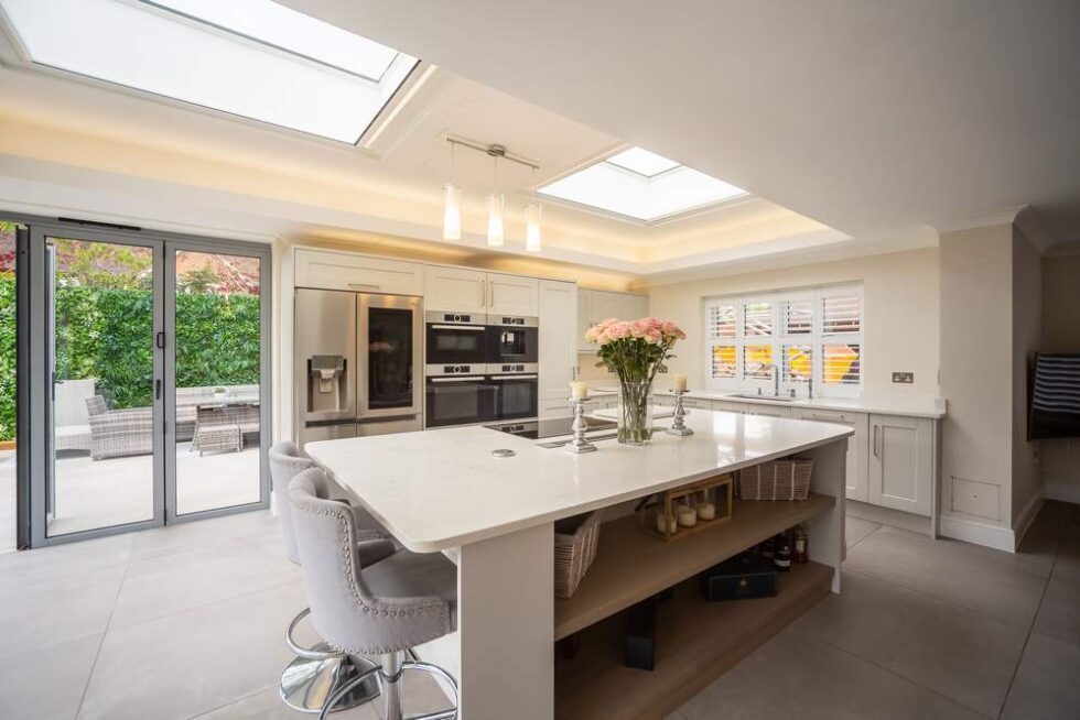 Howdens Dove Grey Shaker Kitchen with Island & Granite Worktops ...